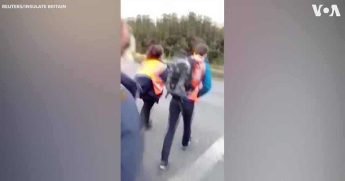 Environmental Activists Block M25 Motorway Traffic in Britain