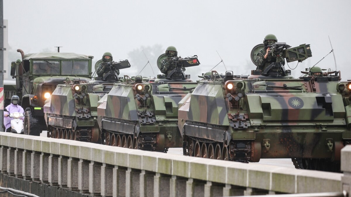 China warns of Taiwan 'war' as military drills encircle island