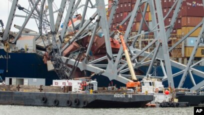 Crews prepare for controlled demolition as cleanup continues at ...