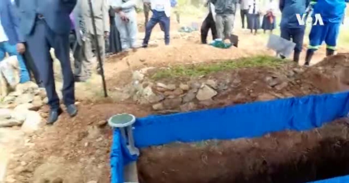 Placing Elvis Nyathi's Burnt Clothes in His Grave