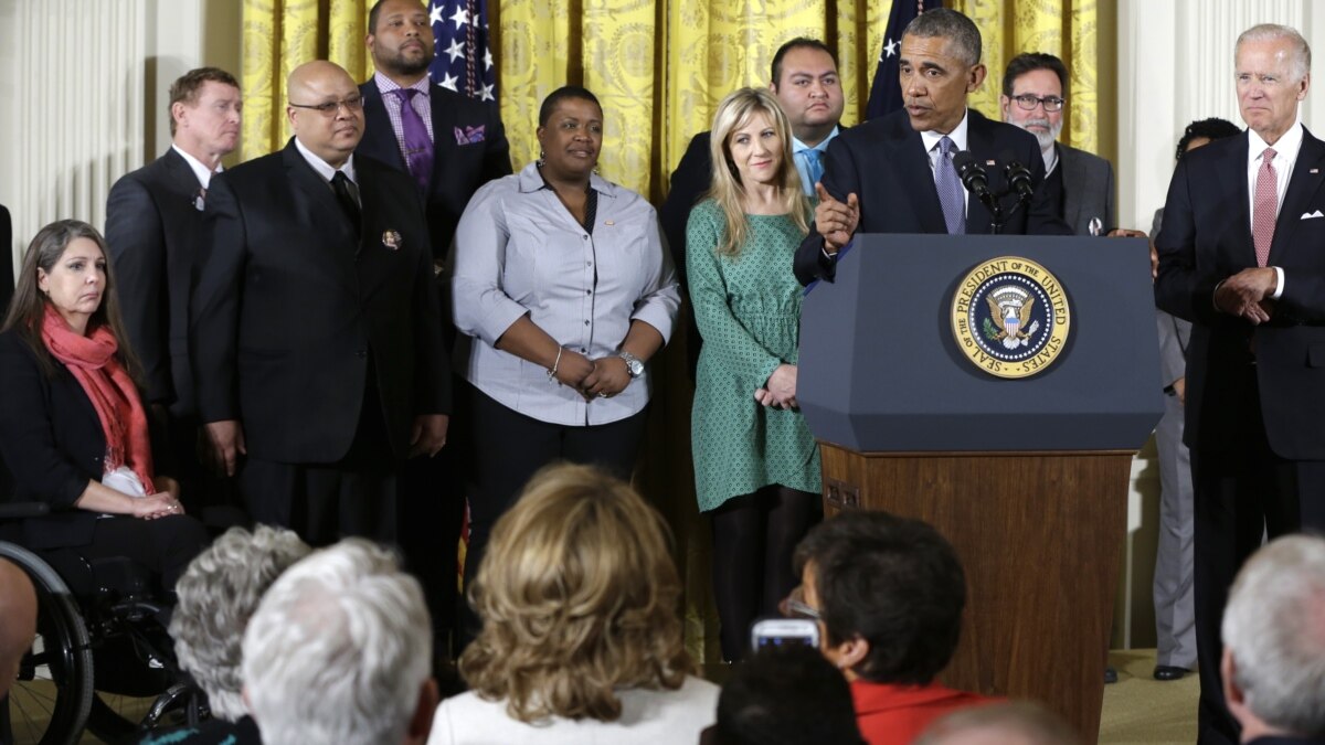 An Emotional Obama Sets New Gun Rules