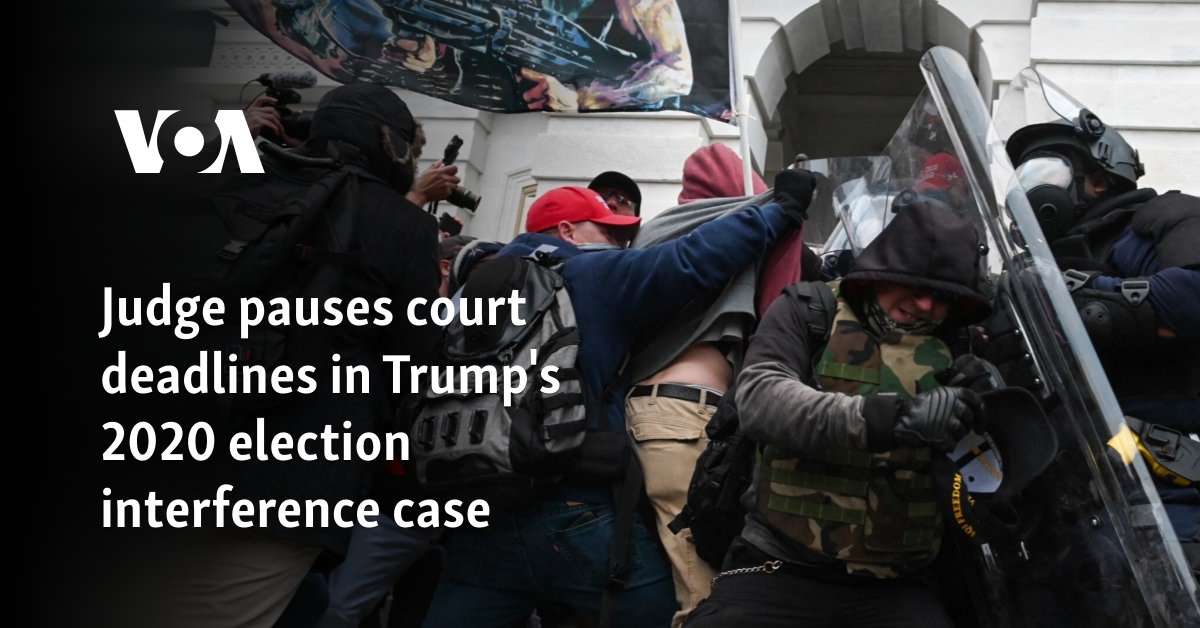 Judge pauses court deadlines in Trump's 2020 election interference case