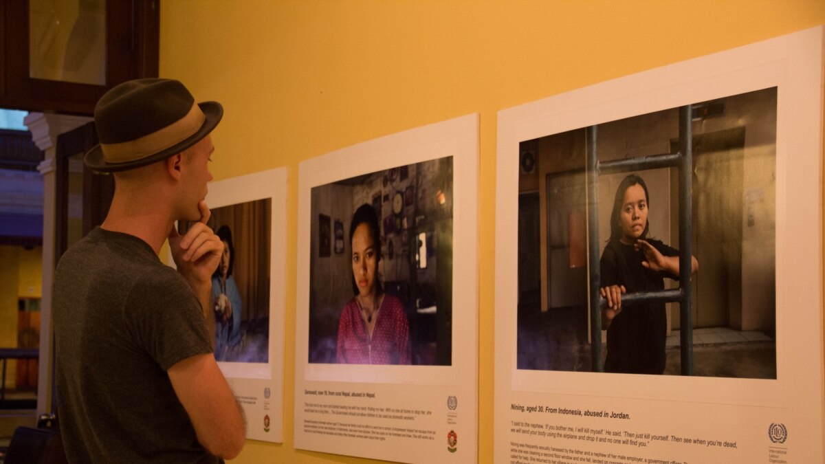 Photo Exhibit Captures Portraits of Migrant Workers