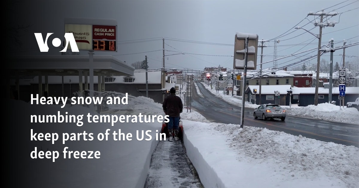 Heavy snow and numbing temperatures keep parts of the US in deep freeze