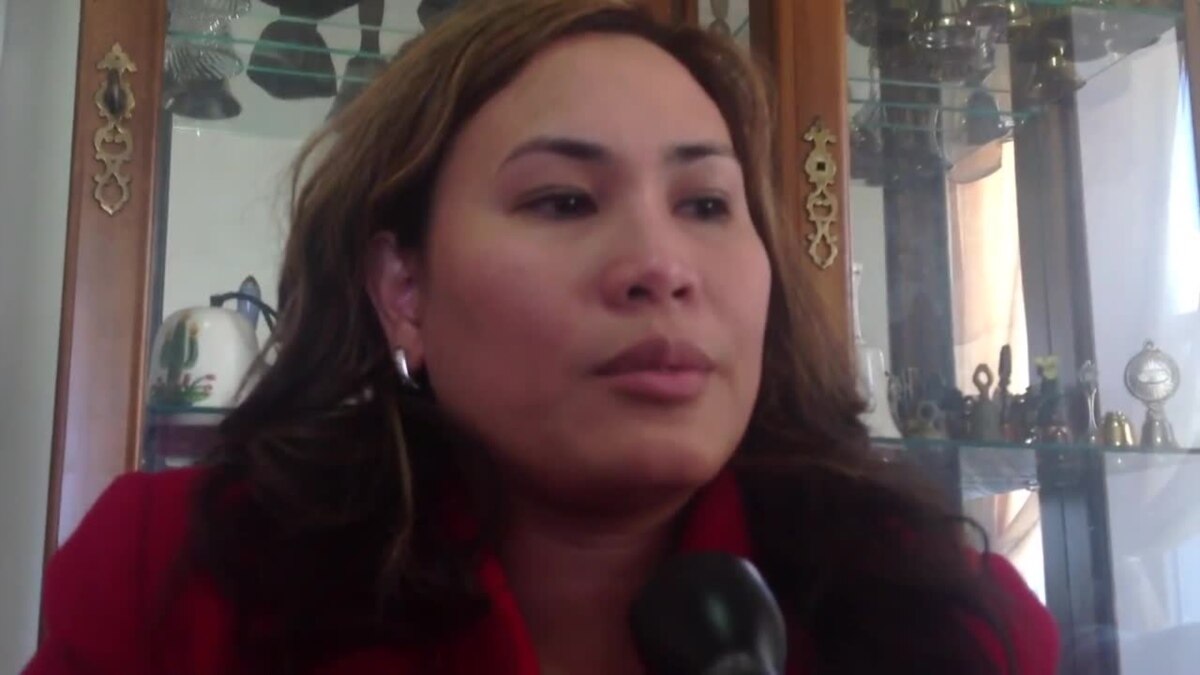 Alvenia Ropeta of the Philippine International Bible Church prays for ...