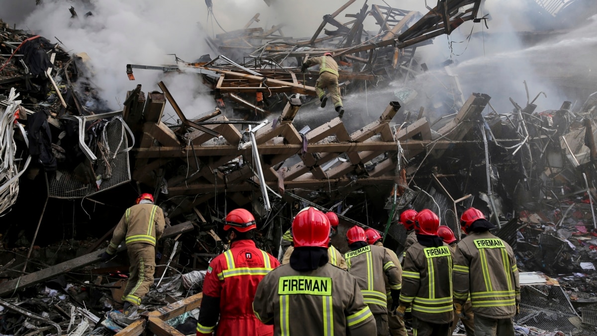 Iranian Rescuers Try to Reach Firefighters Buried in Collapsed Tehran ...