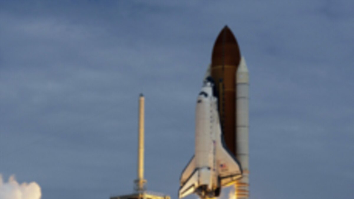 US Astronauts Inspecting Shuttle for Damage