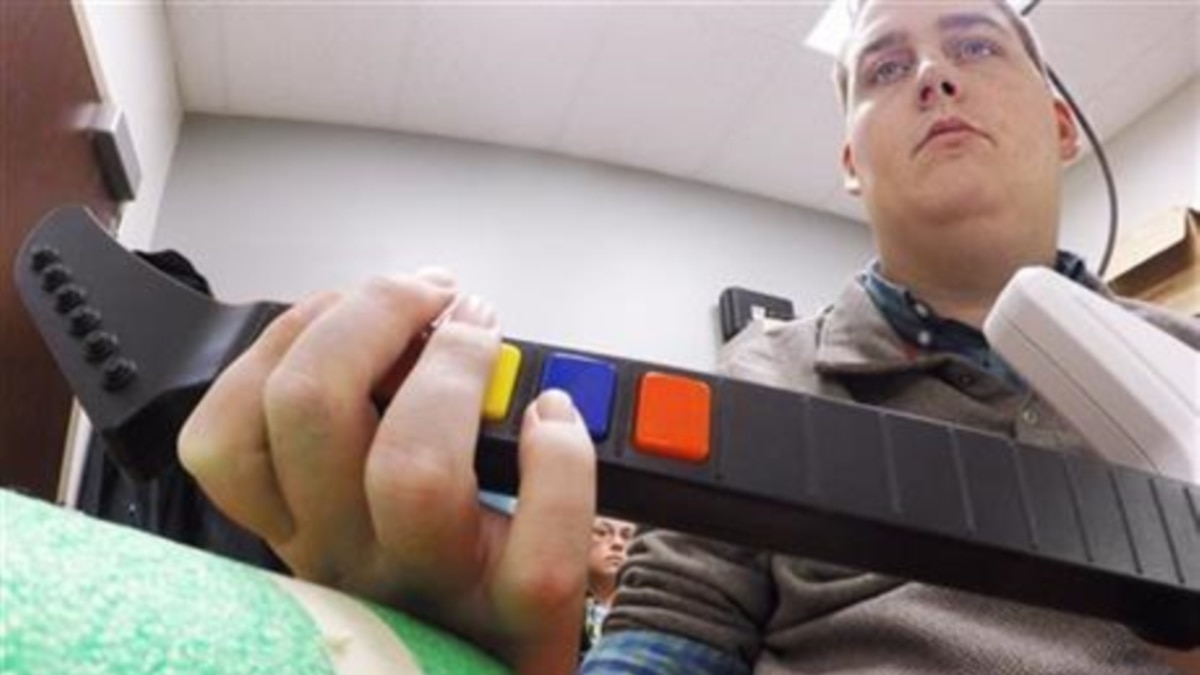 Device Helps Paralyzed Man Move Hands Perform Simple Tasks