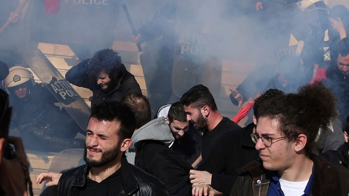 Greek Riot Police Fire Tear Gas at Protesters