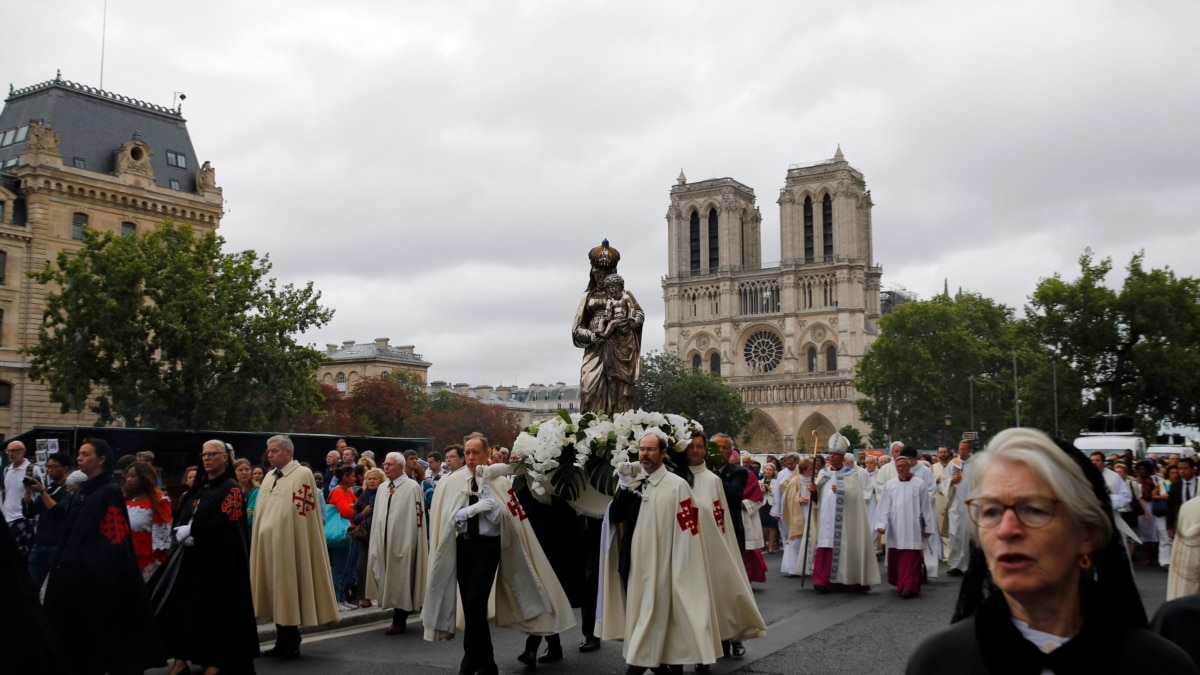 Emotional Paris Ceremony Near Notre Dame for Assumption Day