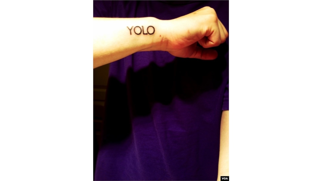 Yolo Tattoo On Wrist