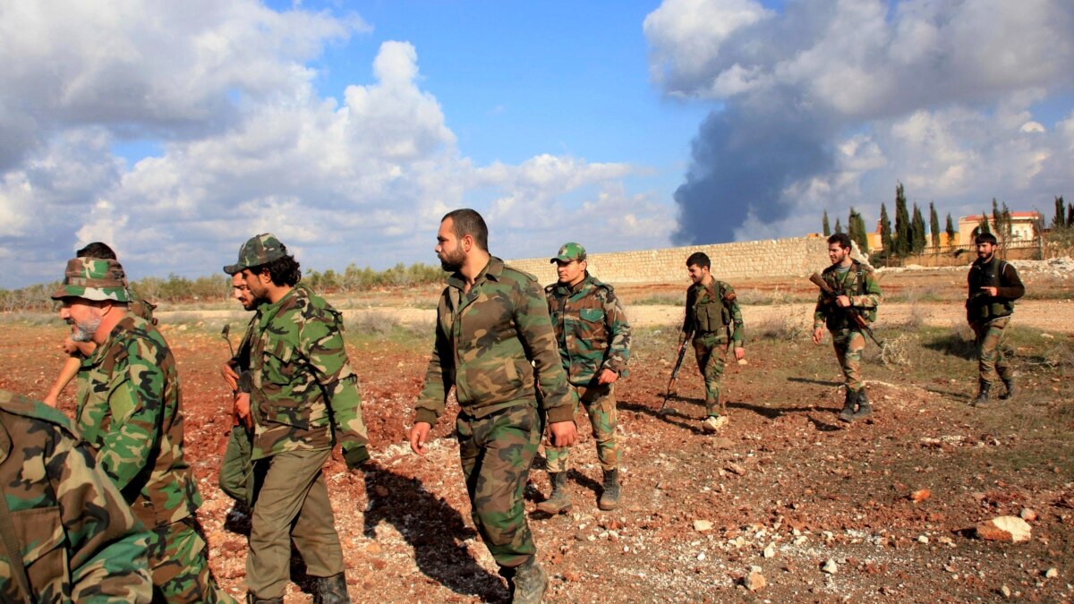 Activists: Al-Qaida Fighters Seize Two Syrian Bases