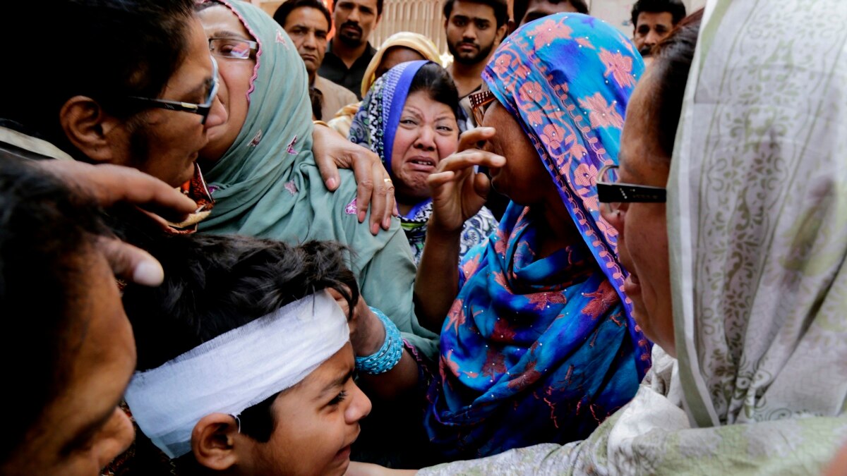 Pakistanis Bury Children Killed in Terror Attack