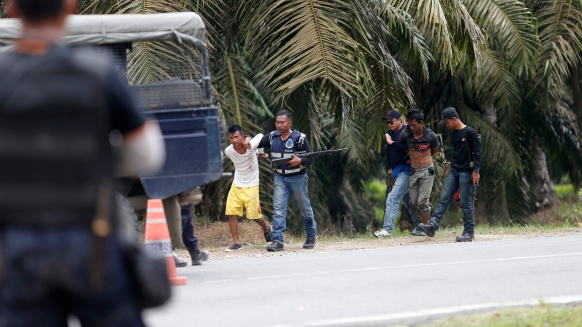 Malaysia Kills 13 Filipino Fighters in Sabah Raid