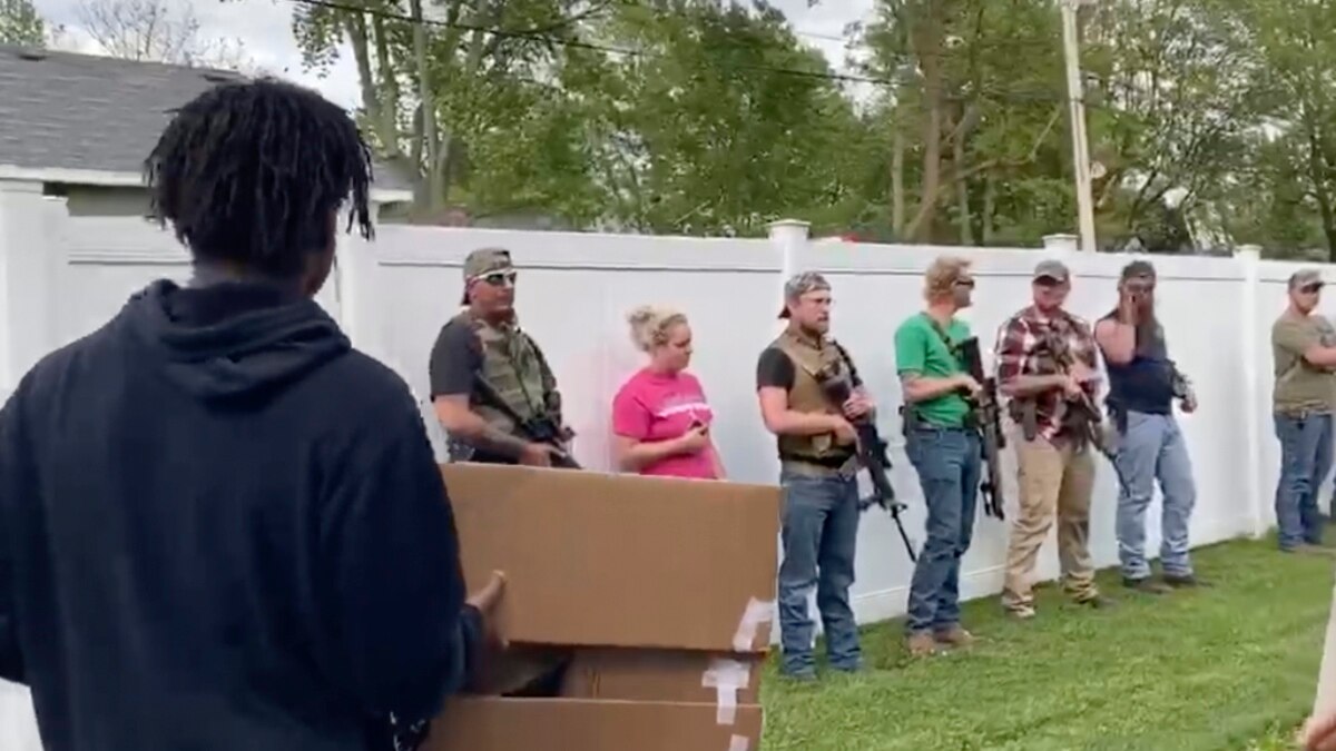 Armed Bystanders Watch Floyd Protesters March in Indiana