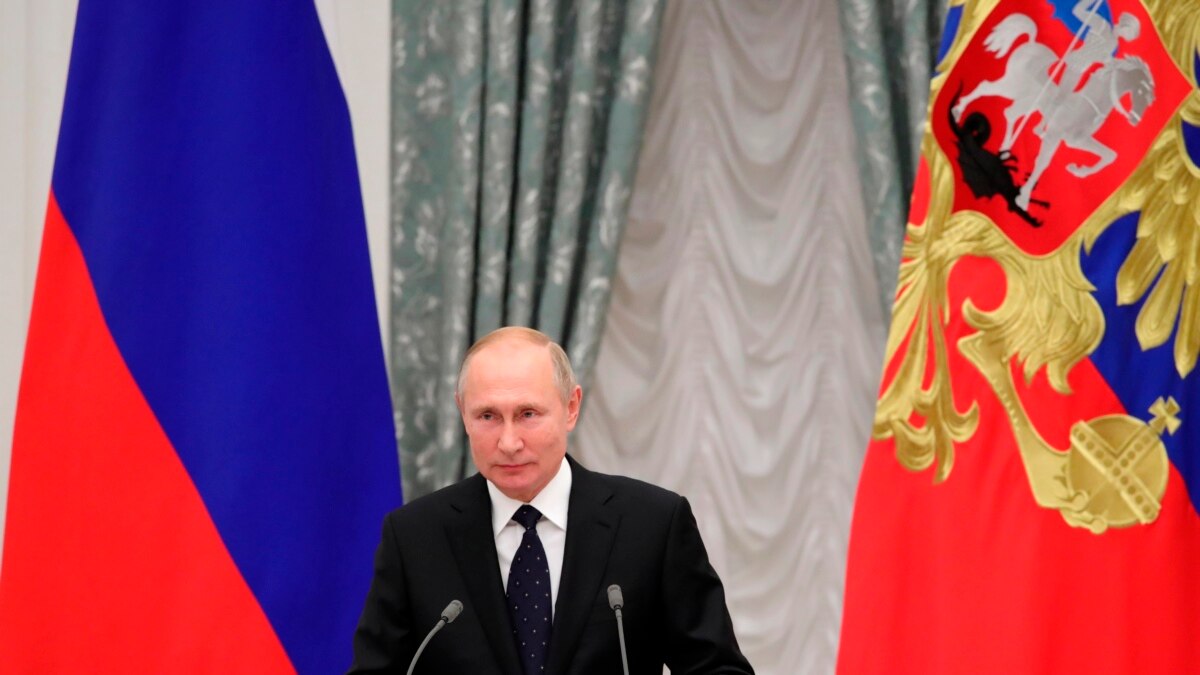 Putin Honors Widows Of Experts Who Died In Rocket Explosion