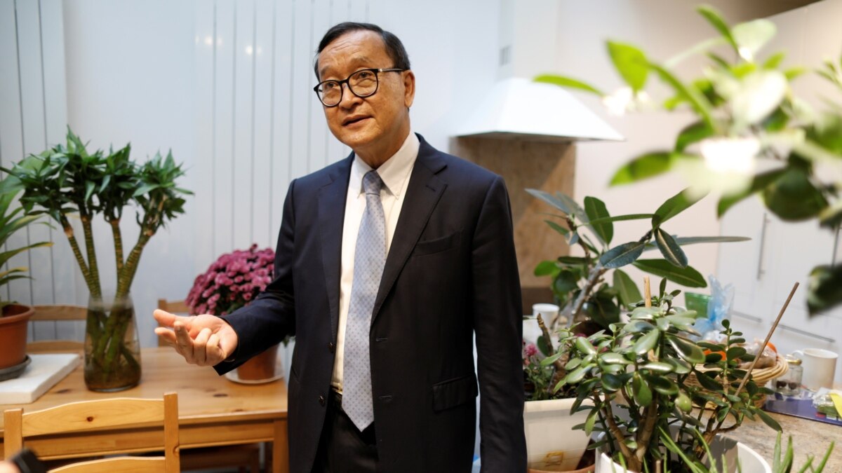 Facing Arrest, Cambodia's Sam Rainsy Will Get Home Come What May